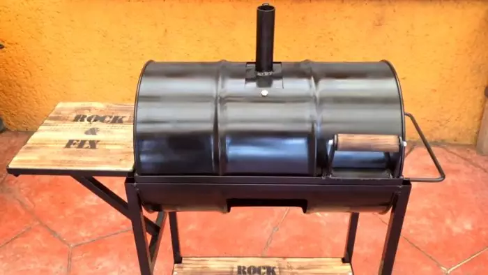Full-size metal barrel grill.