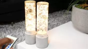 מנורות LED מושגי עשוי זכוכית ובטון עם הידיים שלהם 3718_1
